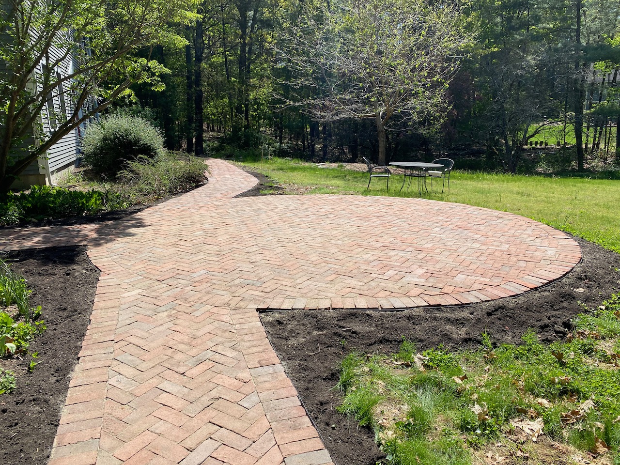 Circular Brick patio and walkway in Sudbury